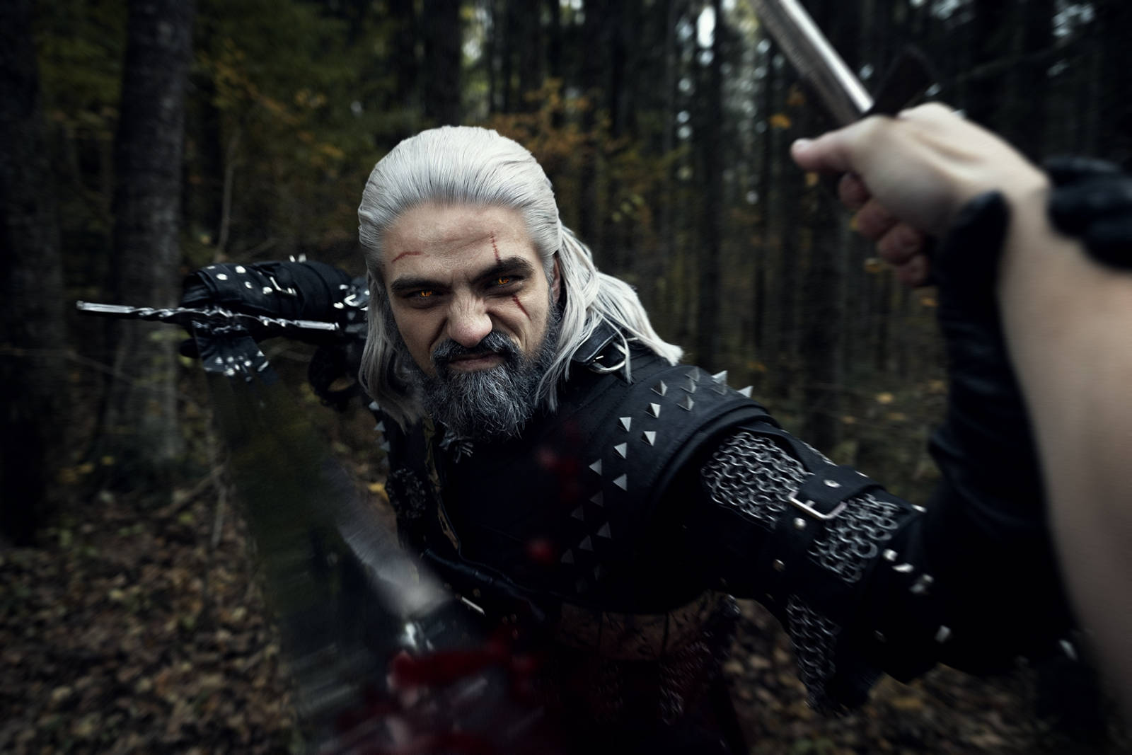 Battle in the Forest: Cosplayer Embodies Geralt from The Witcher Universe
