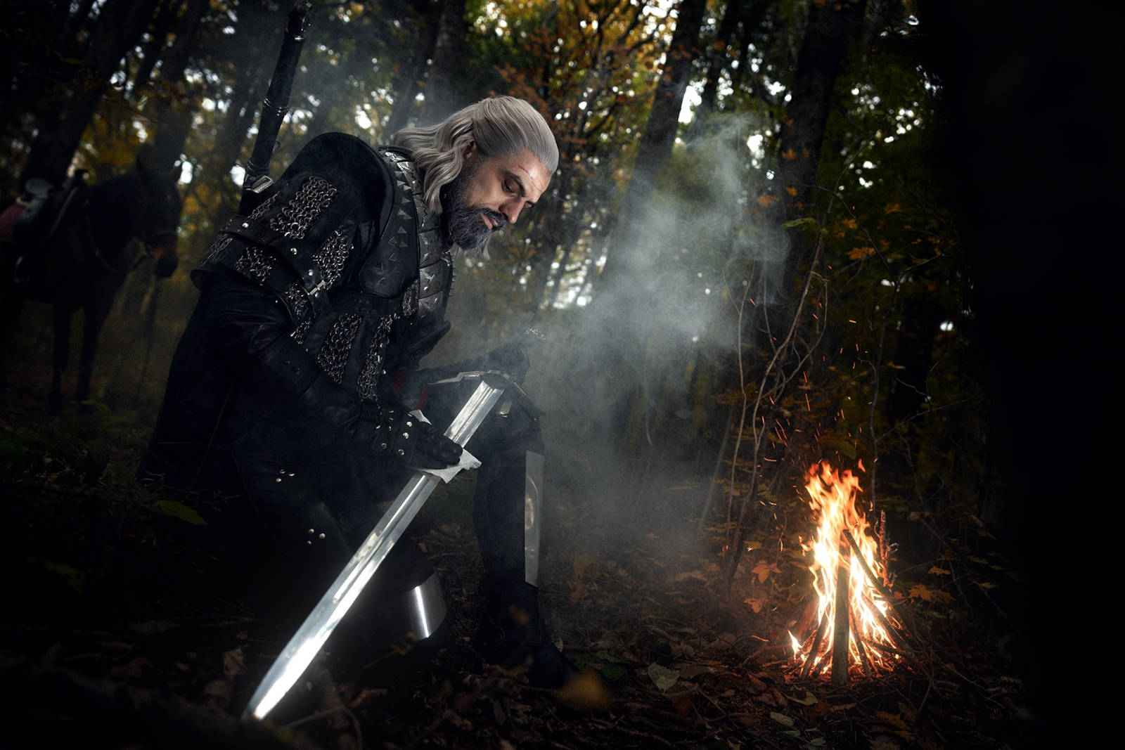 Battle in the Forest: Cosplayer Embodies Geralt from The Witcher Universe